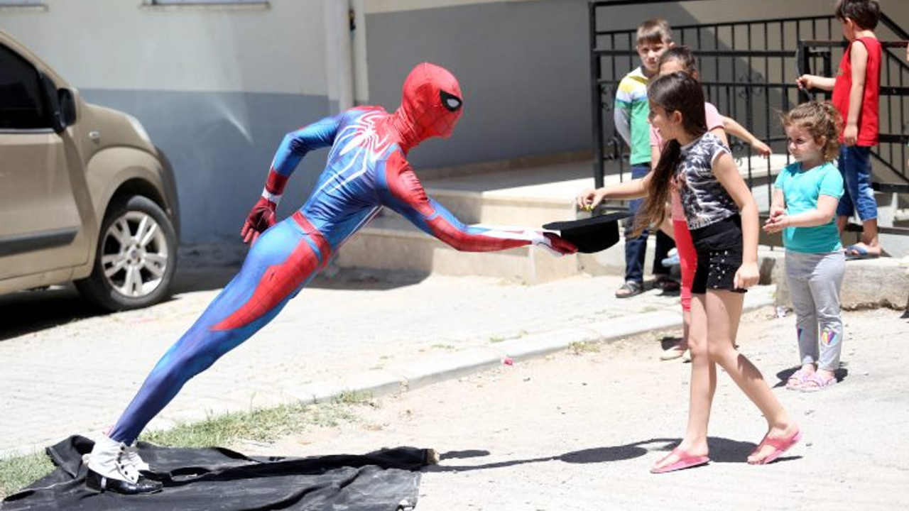Turkish Spider-Man distributes candy to cheer children marking Eid at ...